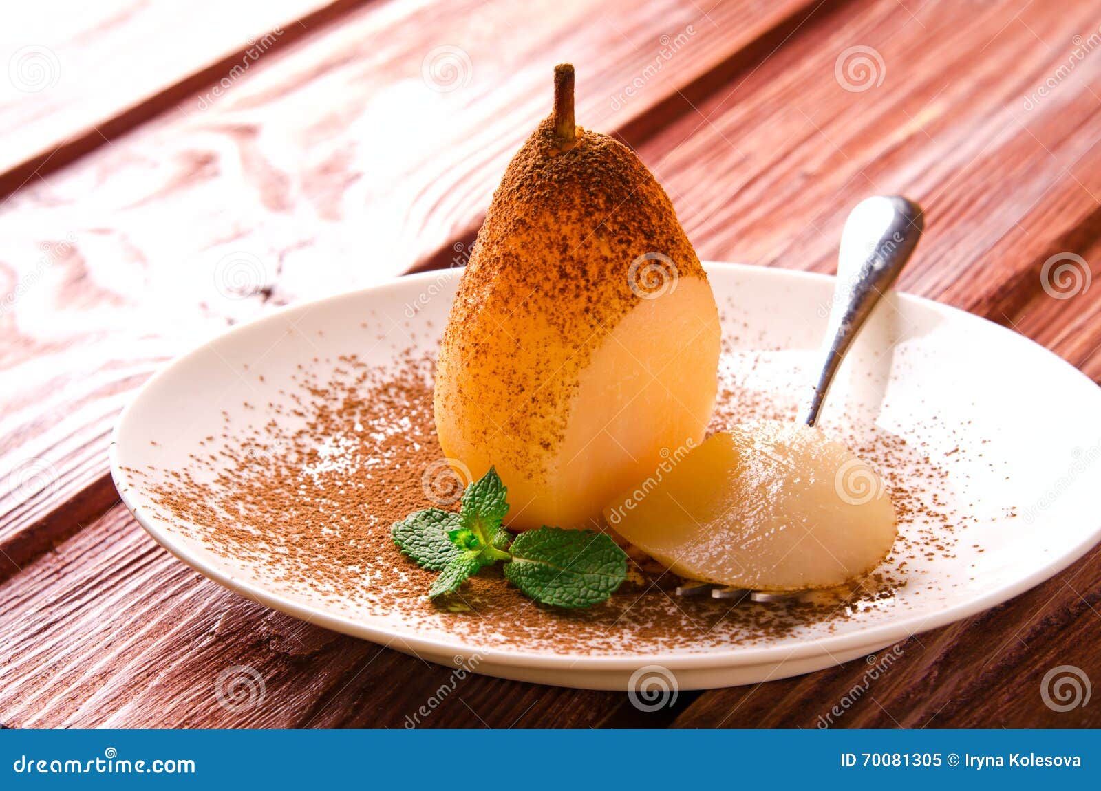 Poached Pears with Cocoa and Mint on White Plate Stock Image - Image of ...