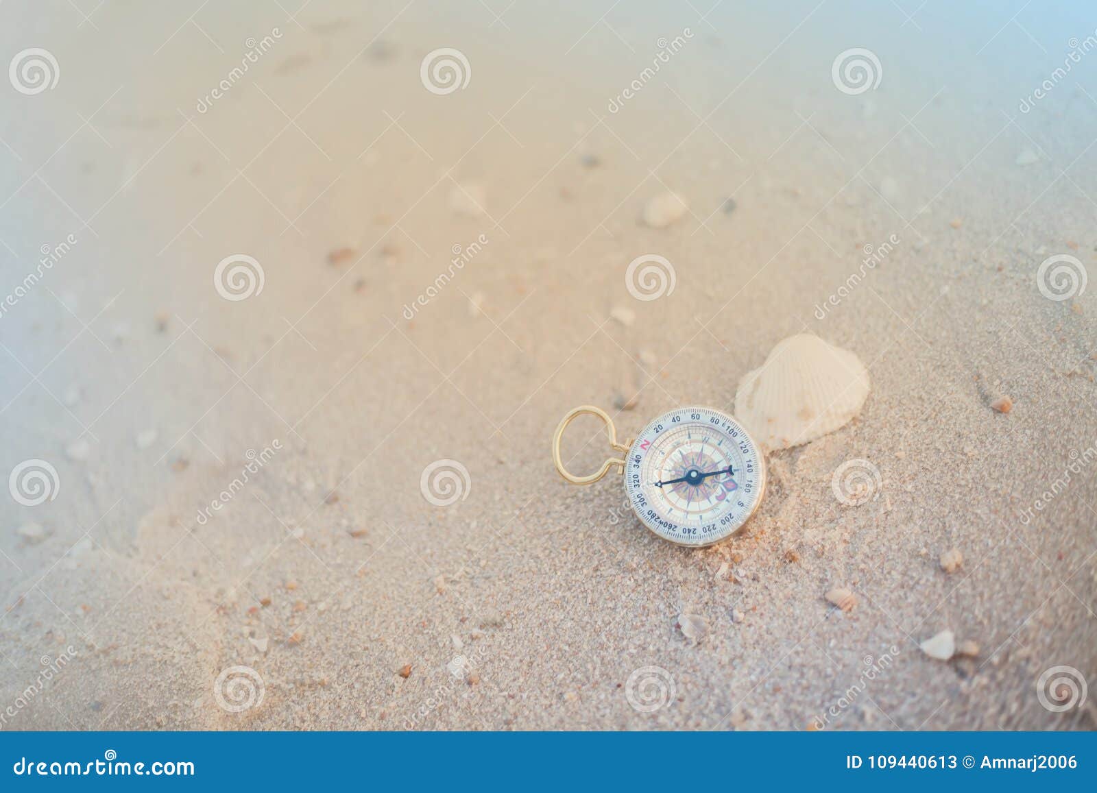 Pocket Compass on Sea Beach Stock Image - Image of marine, gold: 109440613