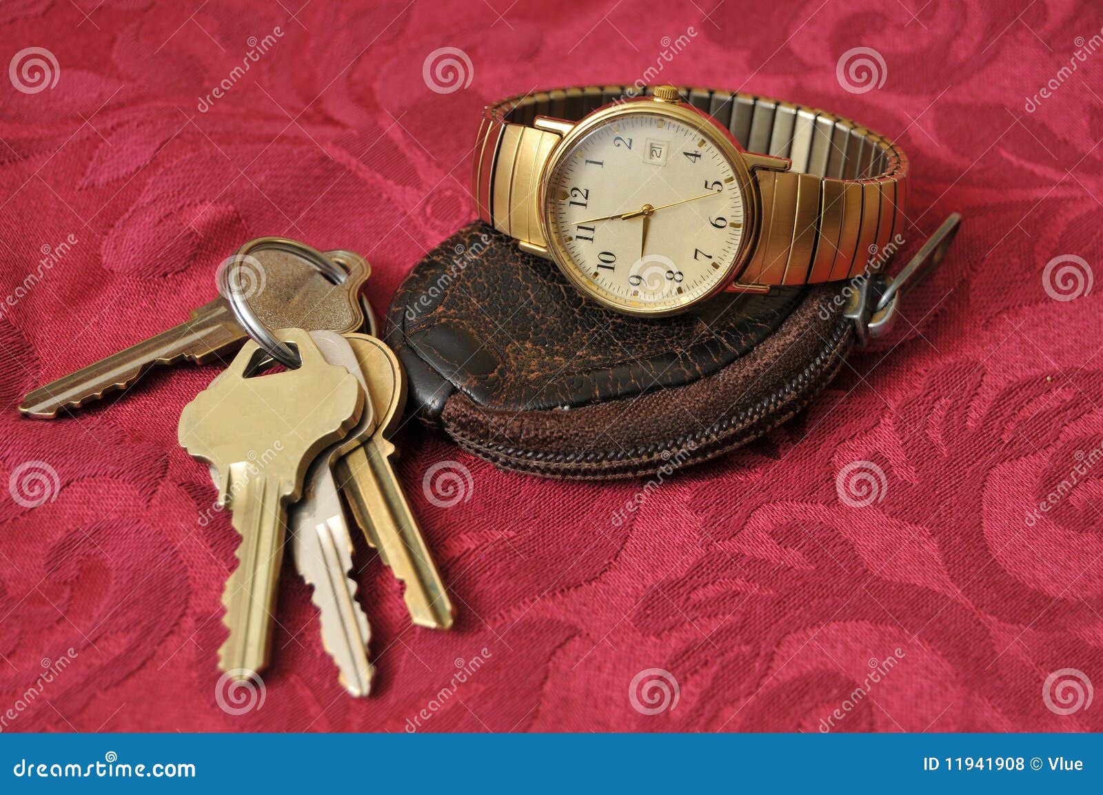 Pocket Items Laying on Red Cloth Stock Photo - Image of coin, cloth ...
