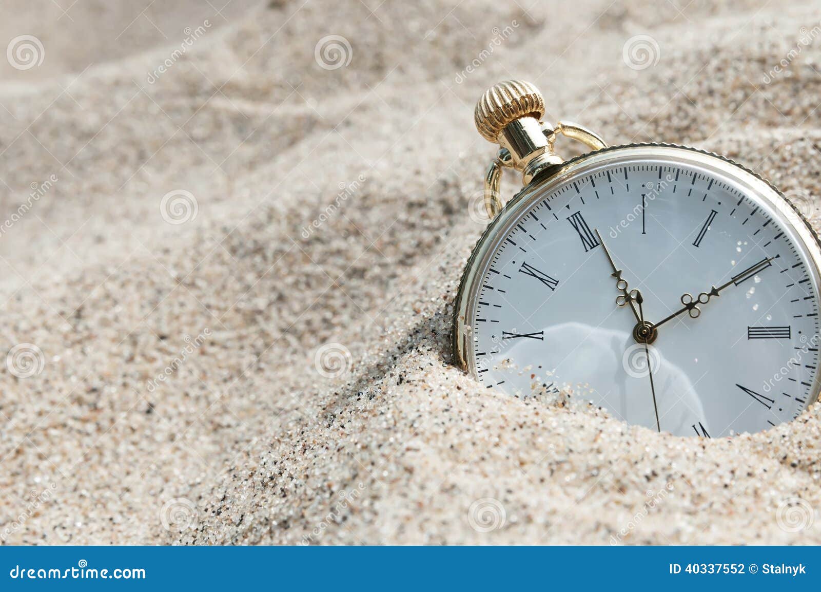Pocket Watch Buried in Sand Stock Photo - Image of closeup, hidden ...