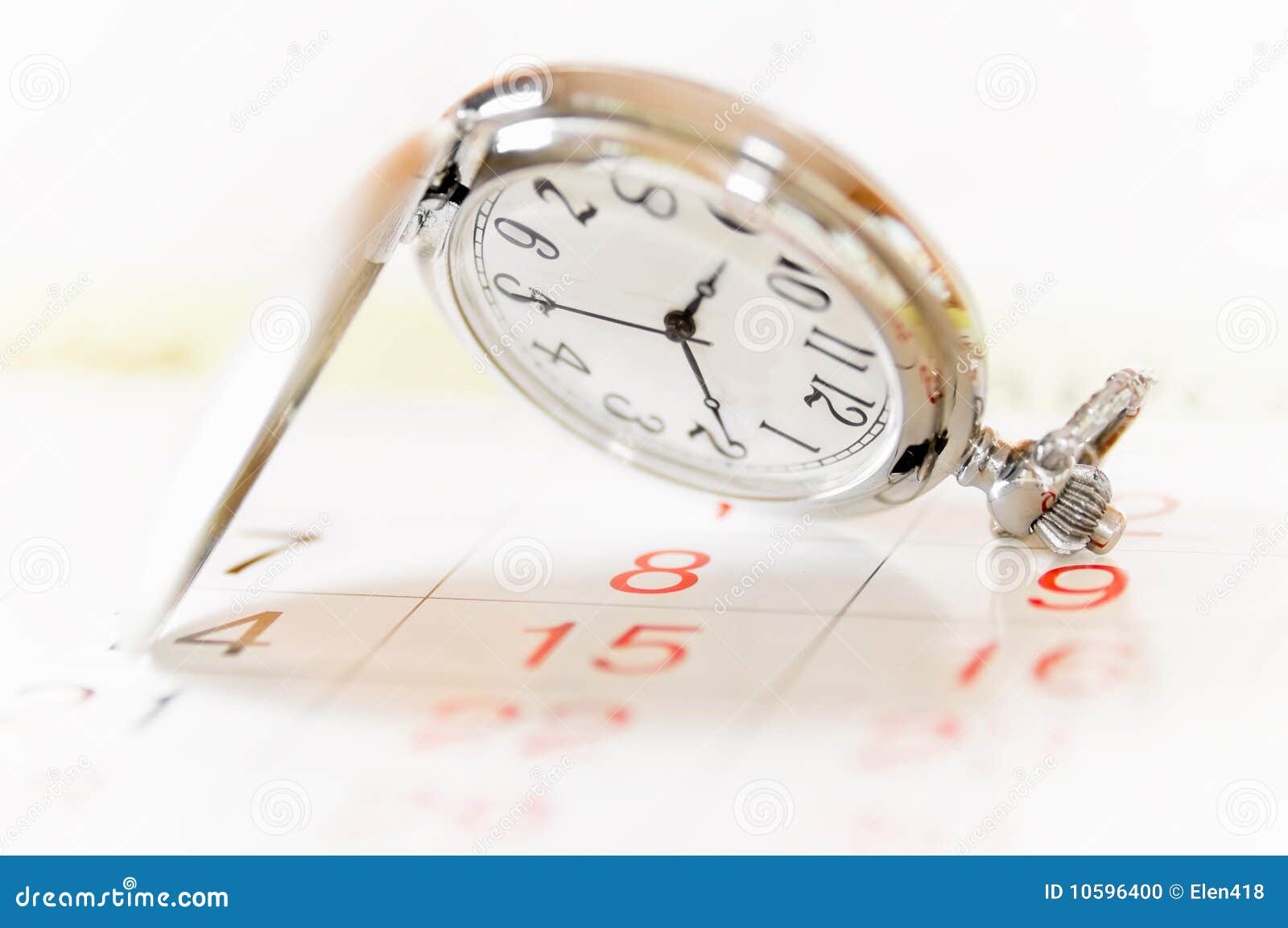 Pocket watch and calendar stock photo. Image of desk - 10596400