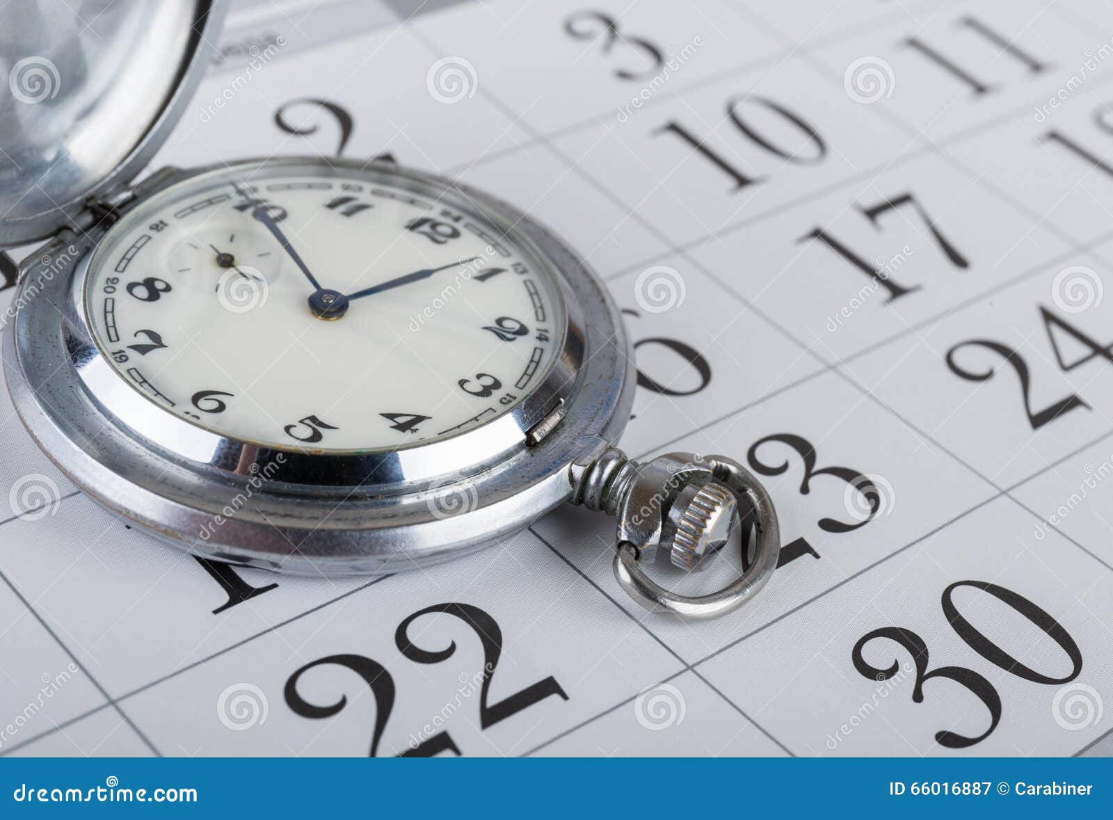 Pocket watch and calendar stock image. Image of circle - 66016887