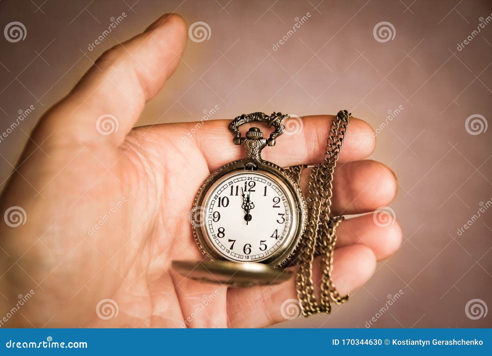 A Pocket Watch in the Hands of a Man Stock Photo - Image of hands ...