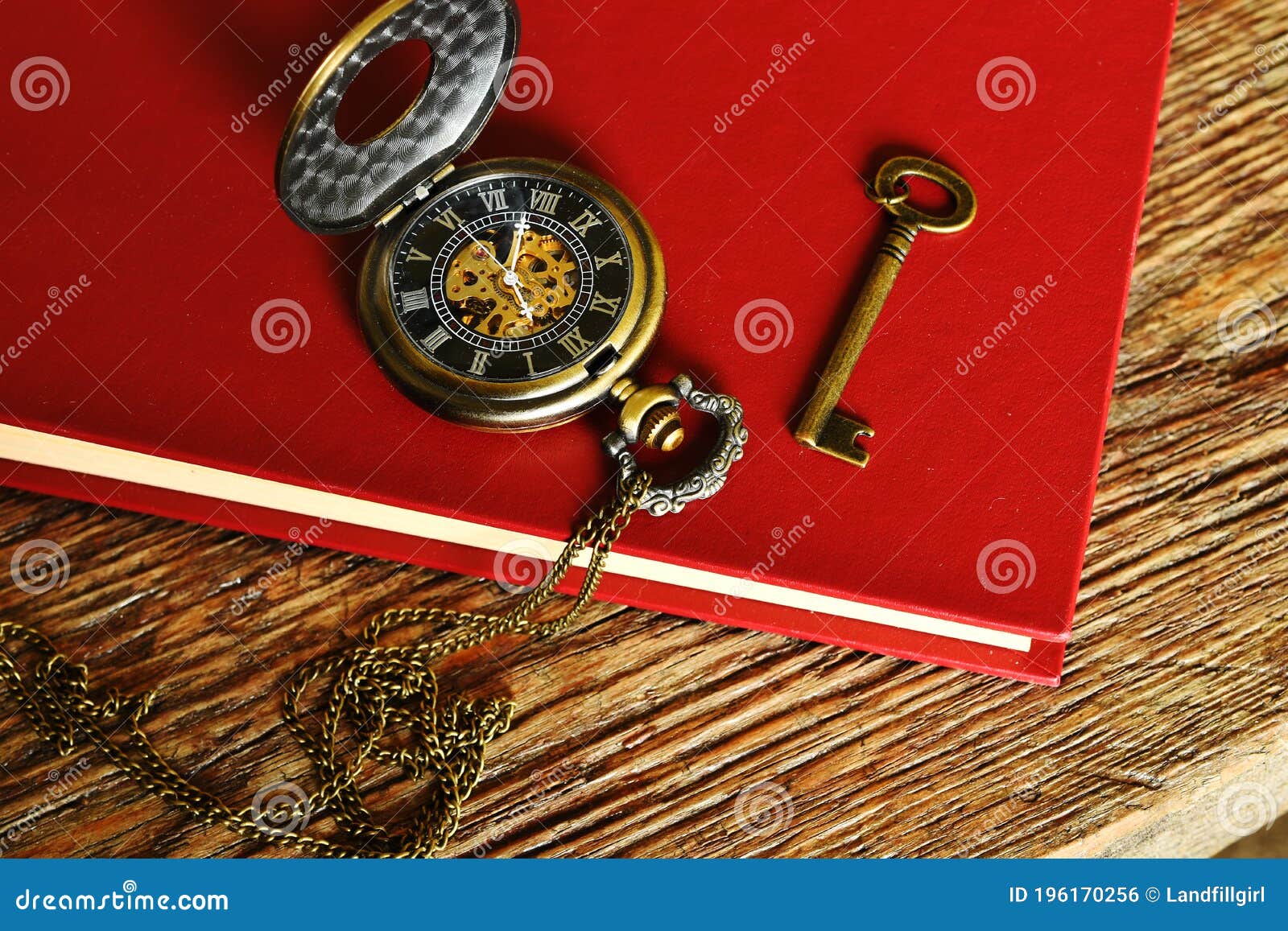 Pocket Watch and Red Book stock photo. Image of bright - 196170256