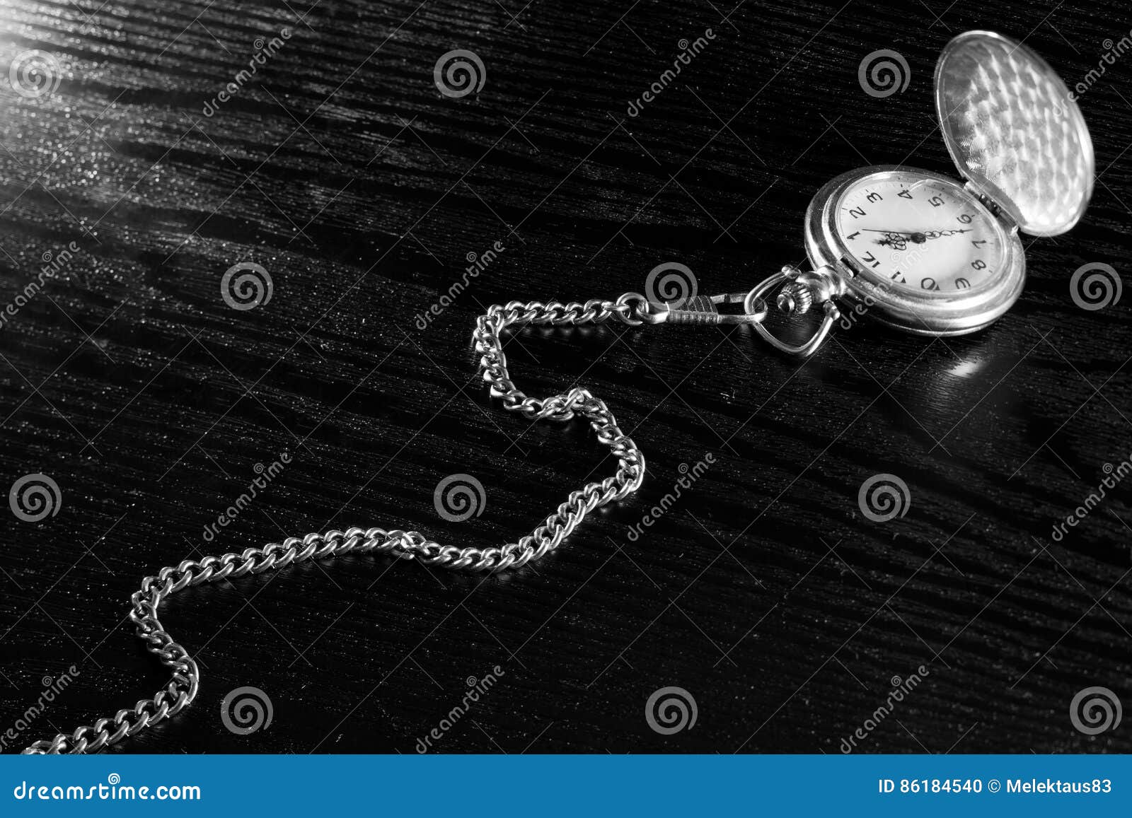 Pocket watch on a table stock photo. Image of watch, fashioned - 86184540