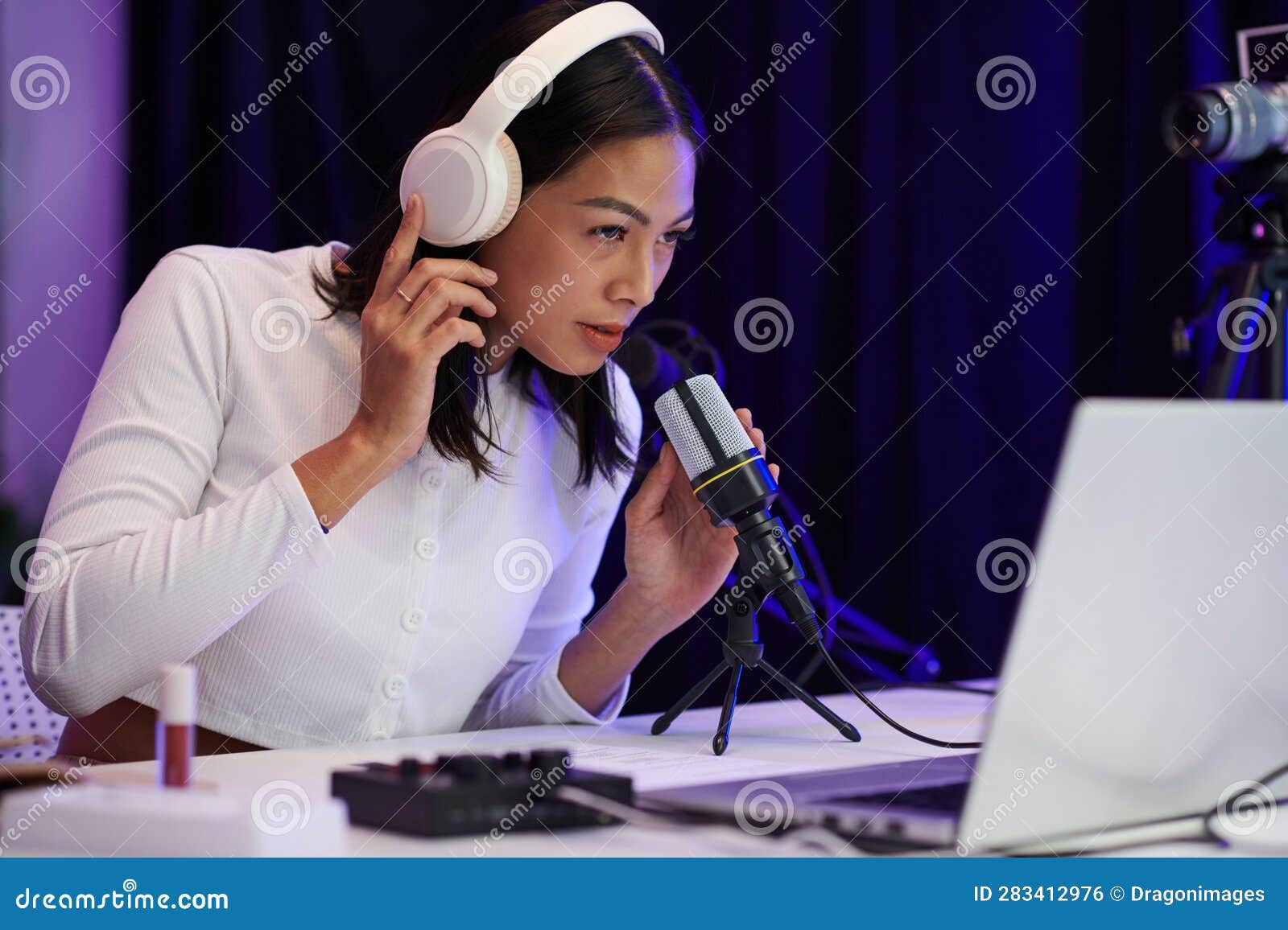 Podcaster Checking Microphone Stock Photo - Image of planner, podcast ...