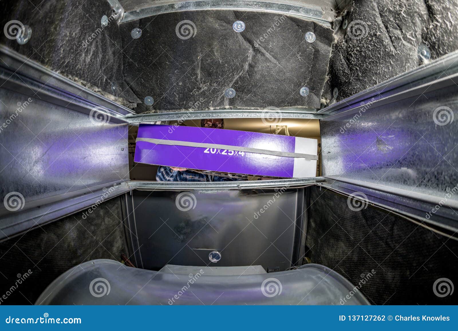 Point of View from Inside a Furnace As a Man Inserts a New Clean Filter ...