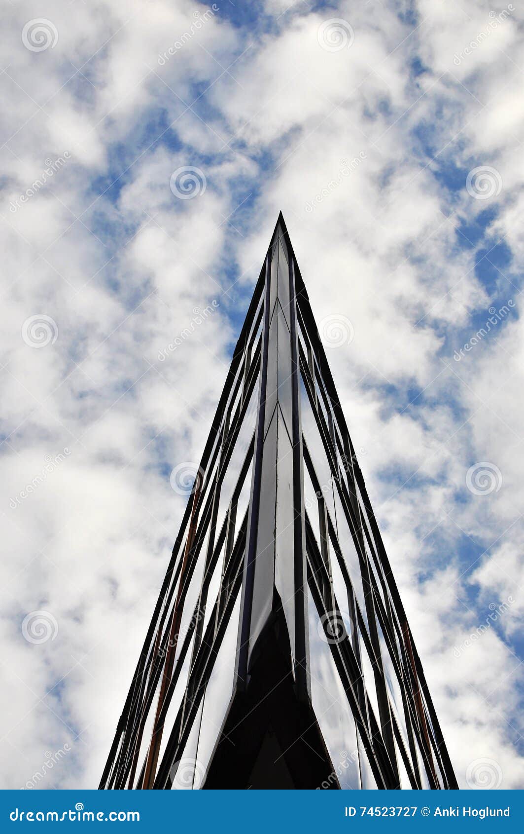 Pointed building in sky stock image. Image of cloud, shape - 74523727