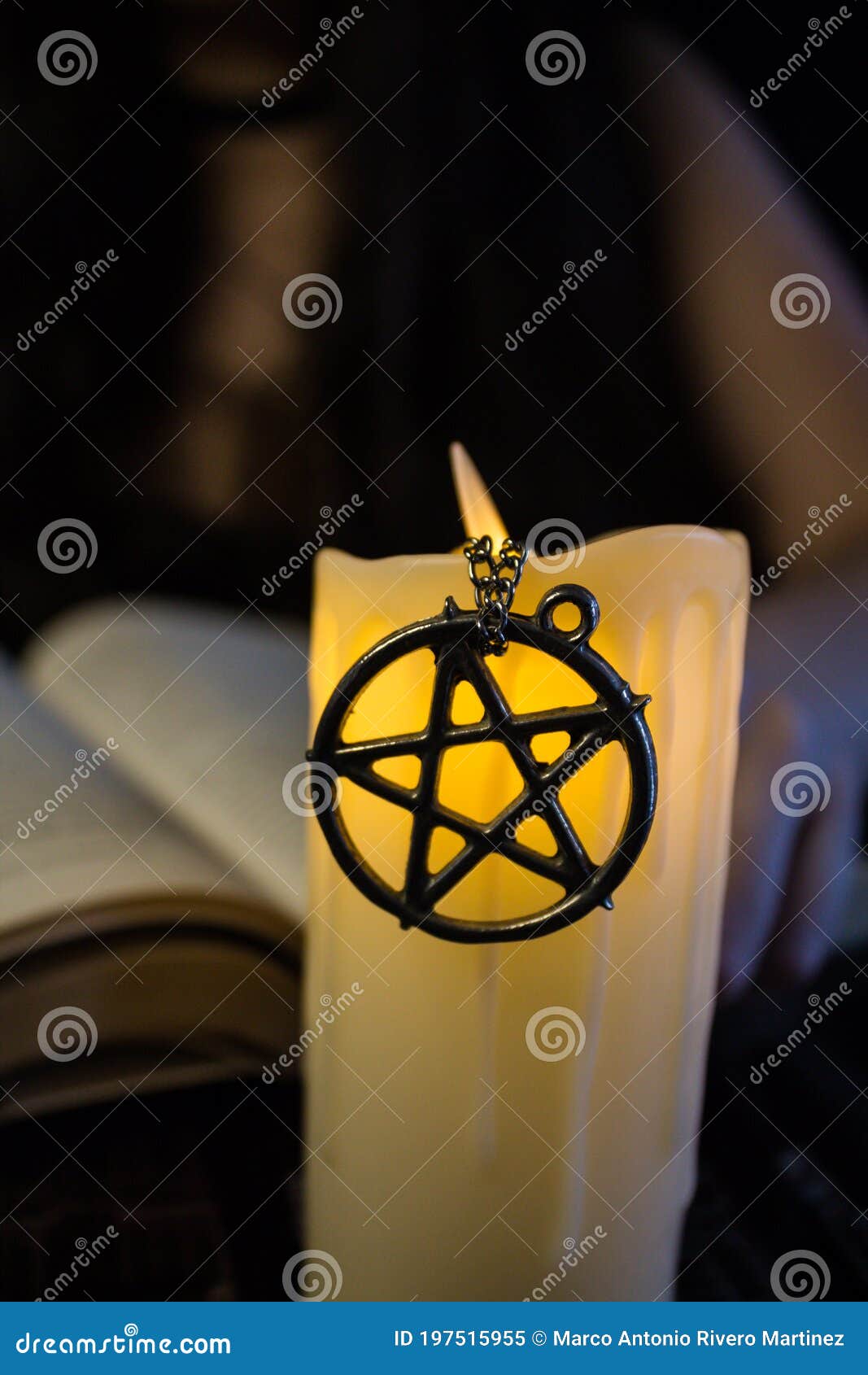 5-pointed star on a candle stock image. Image of nightmare - 197515955