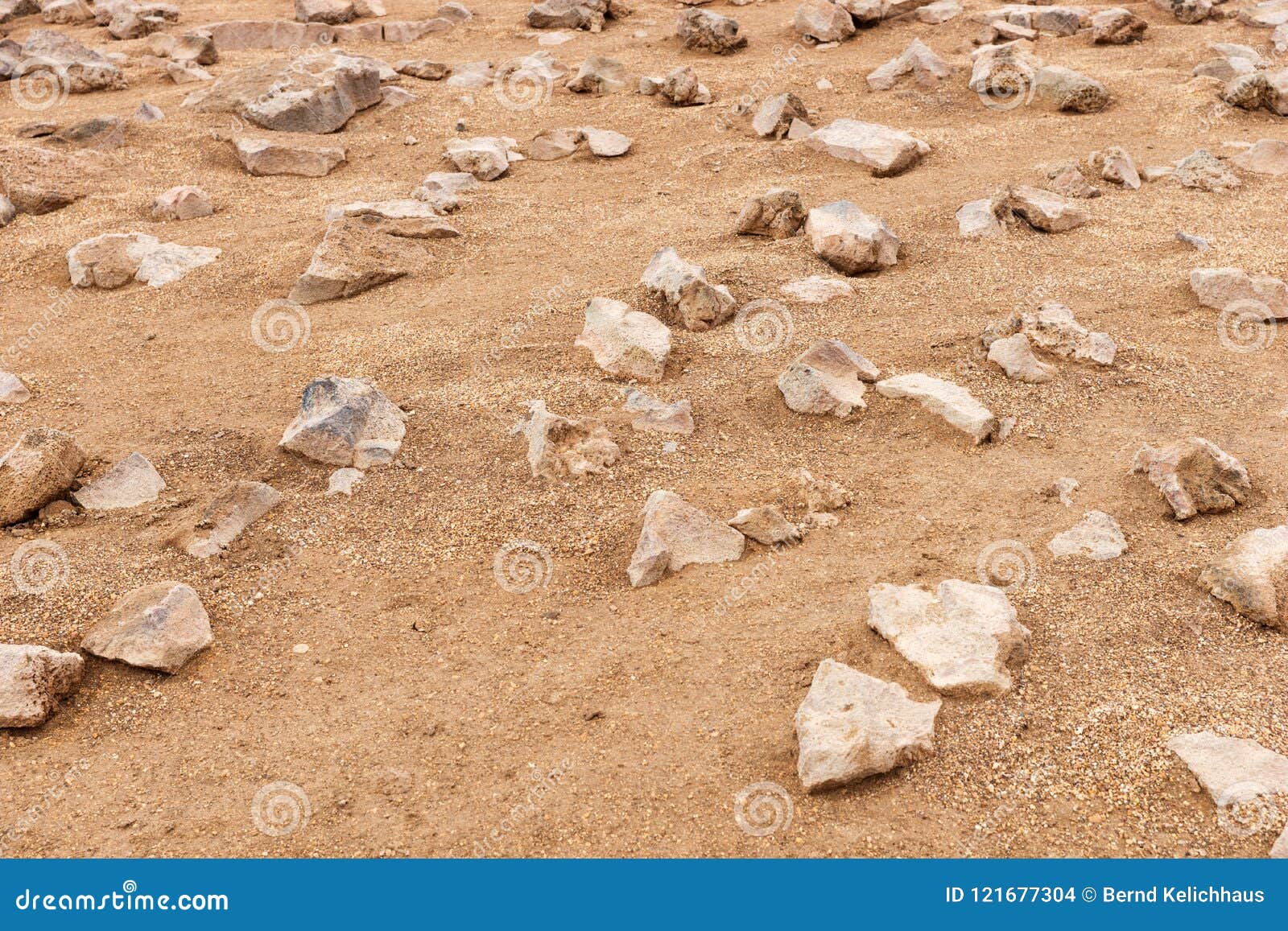 Pointed stones on sand stock photo. Image of ground - 121677304