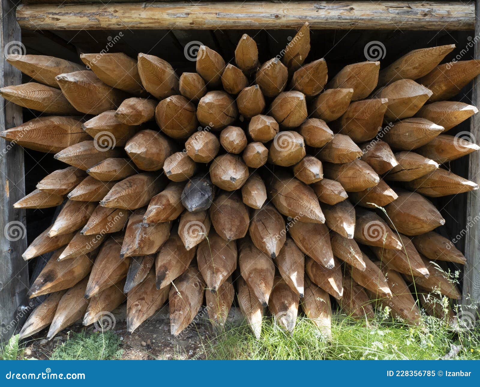 Pointed wood logs pattern stock image. Image of texture - 228356785