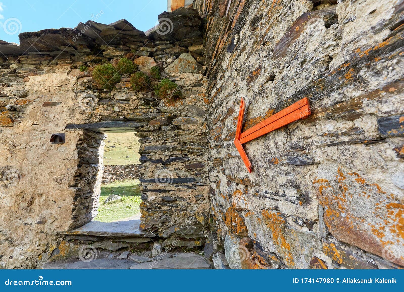 The Pointer on the Stone Wall in Georgia Stock Photo - Image of arrow ...