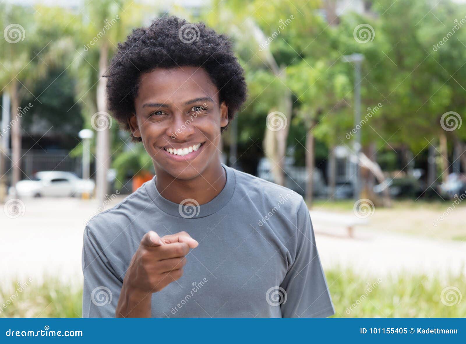 Pointing African American Guy in Grey Shirt Stock Image - Image of ...