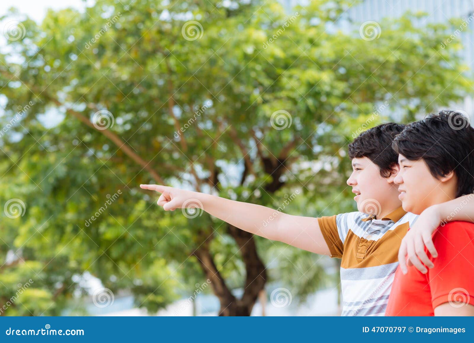 Pointing away stock image. Image of leisure, family, brunet - 47070797