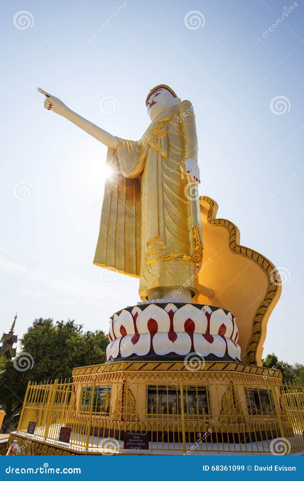 Pointing Buddha statue stock image. Image of buddhism - 68361099