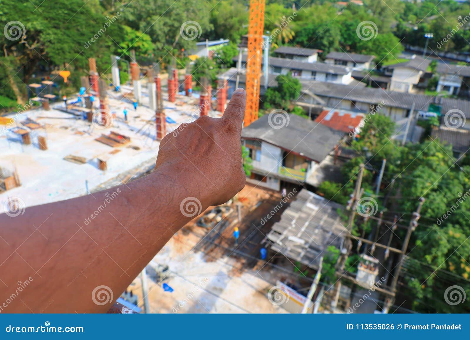 Pointing at a Building Under Construction Stock Photo - Image of city ...
