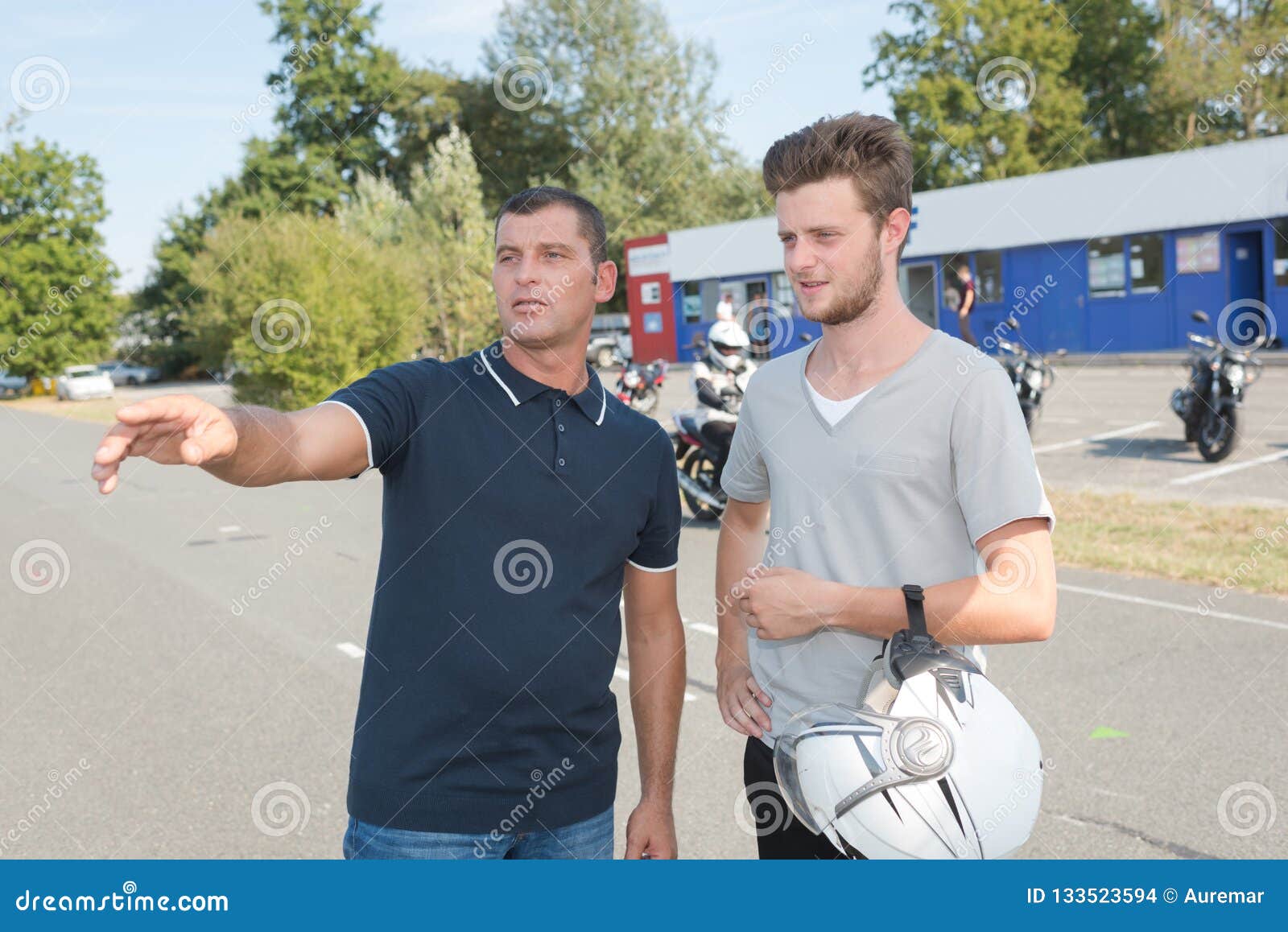 Pointing at the direction stock photo. Image of road - 133523594