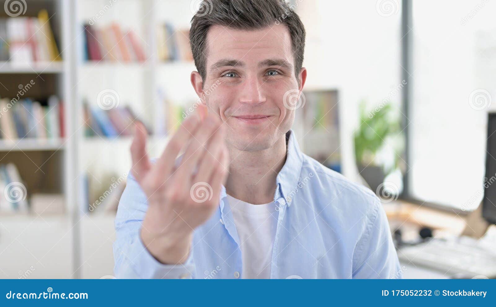 Pointing Finger and Inviting by Young Man Stock Photo - Image of ...