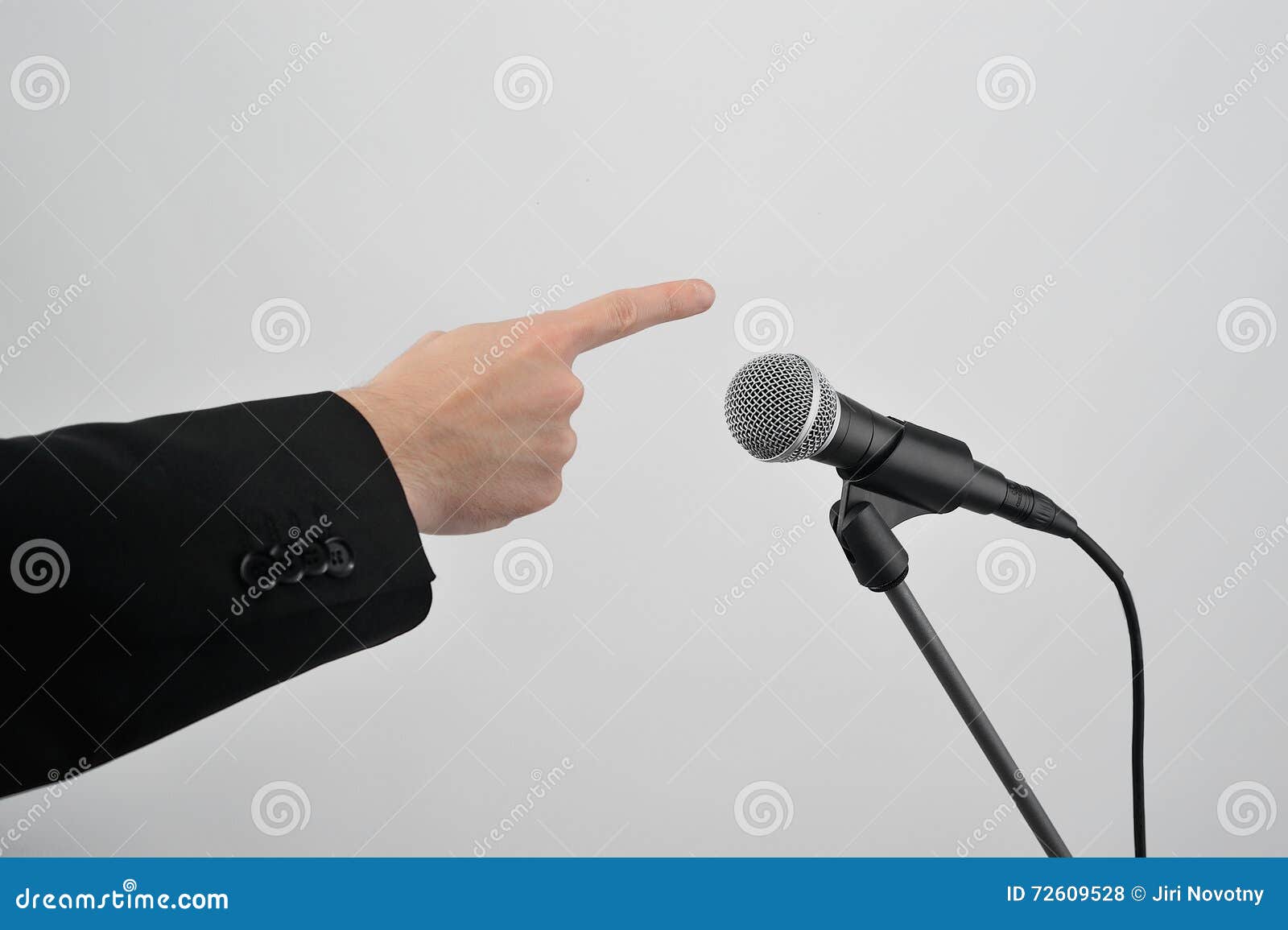 Pointing Finger with Microphone Stock Photo - Image of talking, finger ...