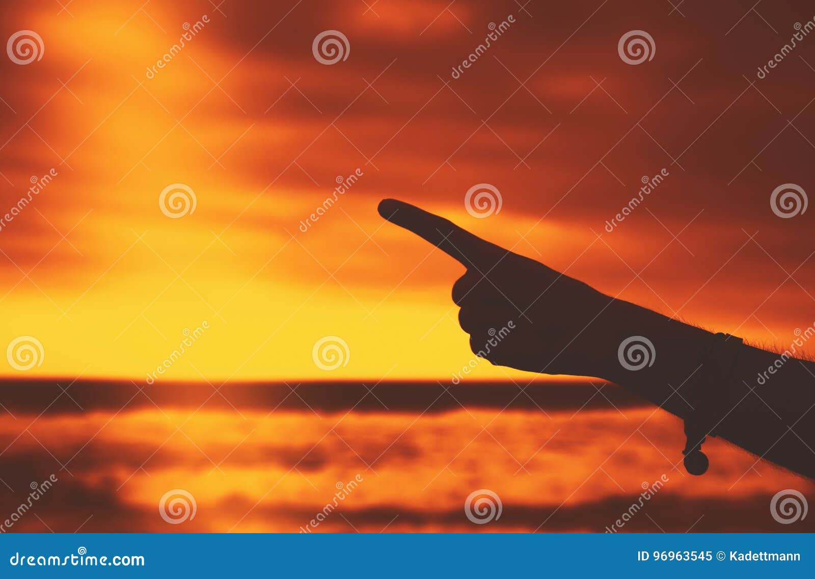 Pointing finger on sunset stock image. Image of dynamic - 96963545