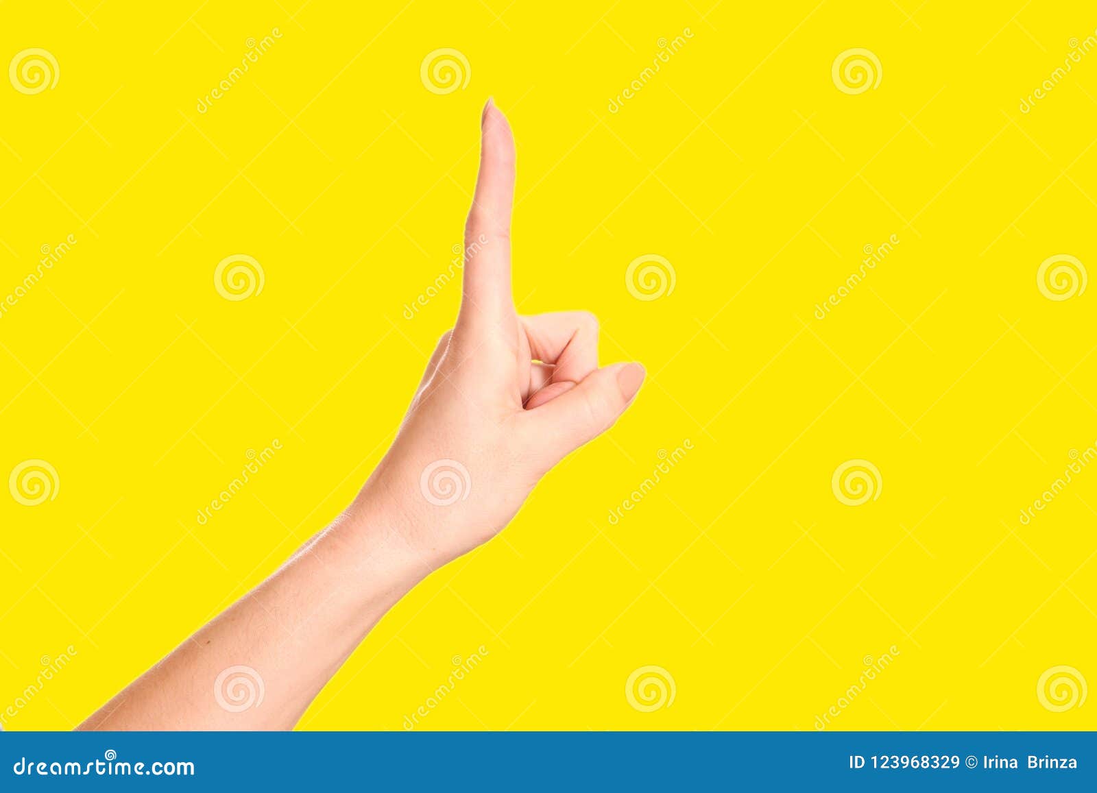 Pointing Finger on Yellow Background. Studio, Person. Stock Image ...