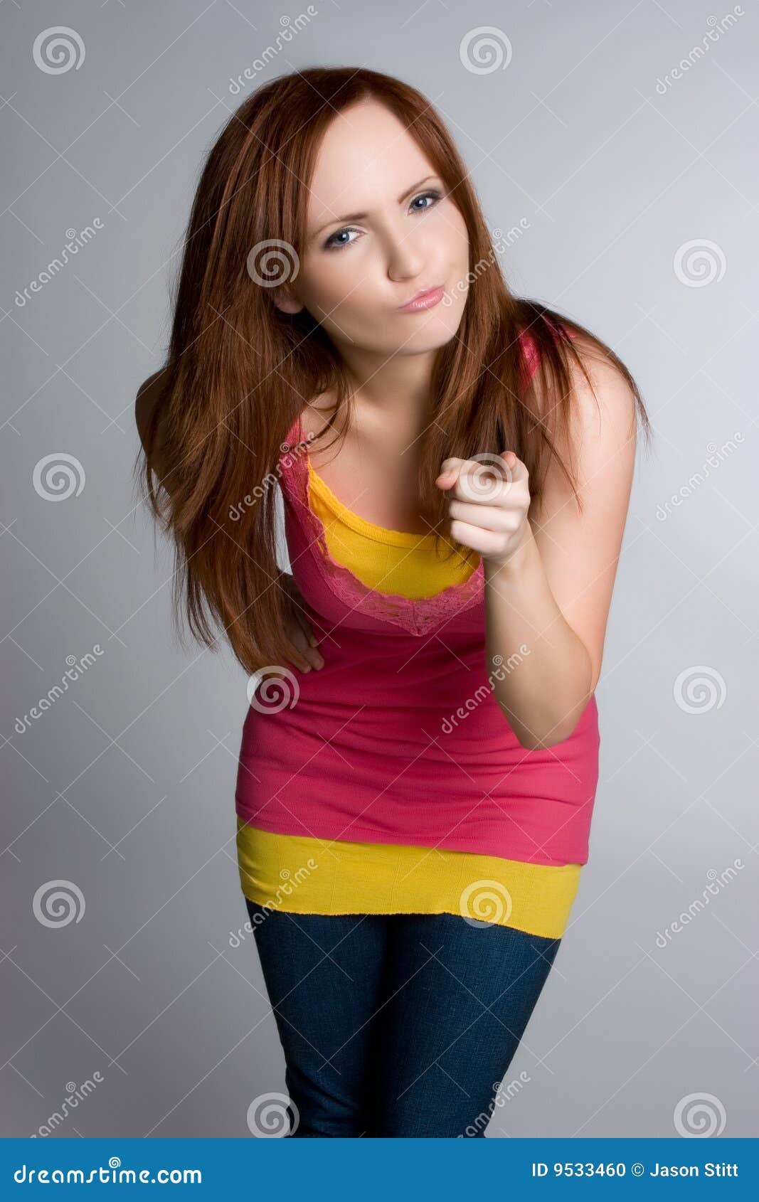 Pointing Girl stock photo. Image of finger, redhead, stern - 9533460