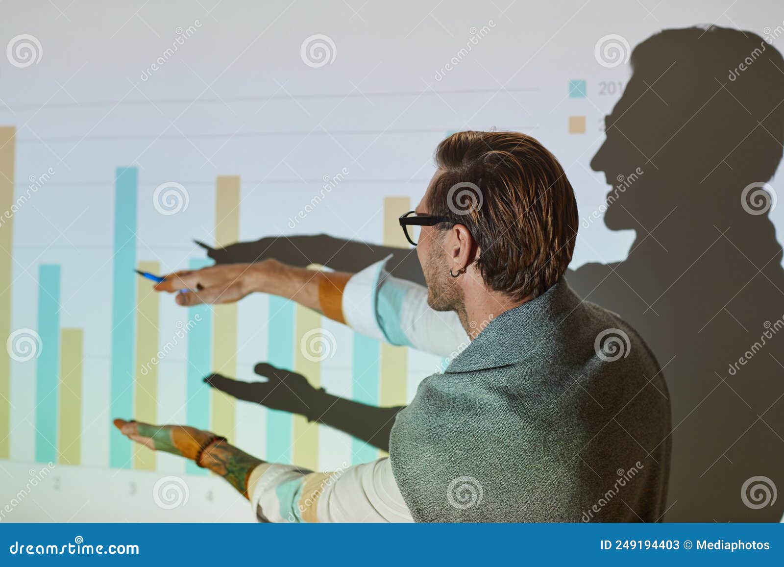 Pointing at Graph on Projection Screen Stock Image - Image of ...