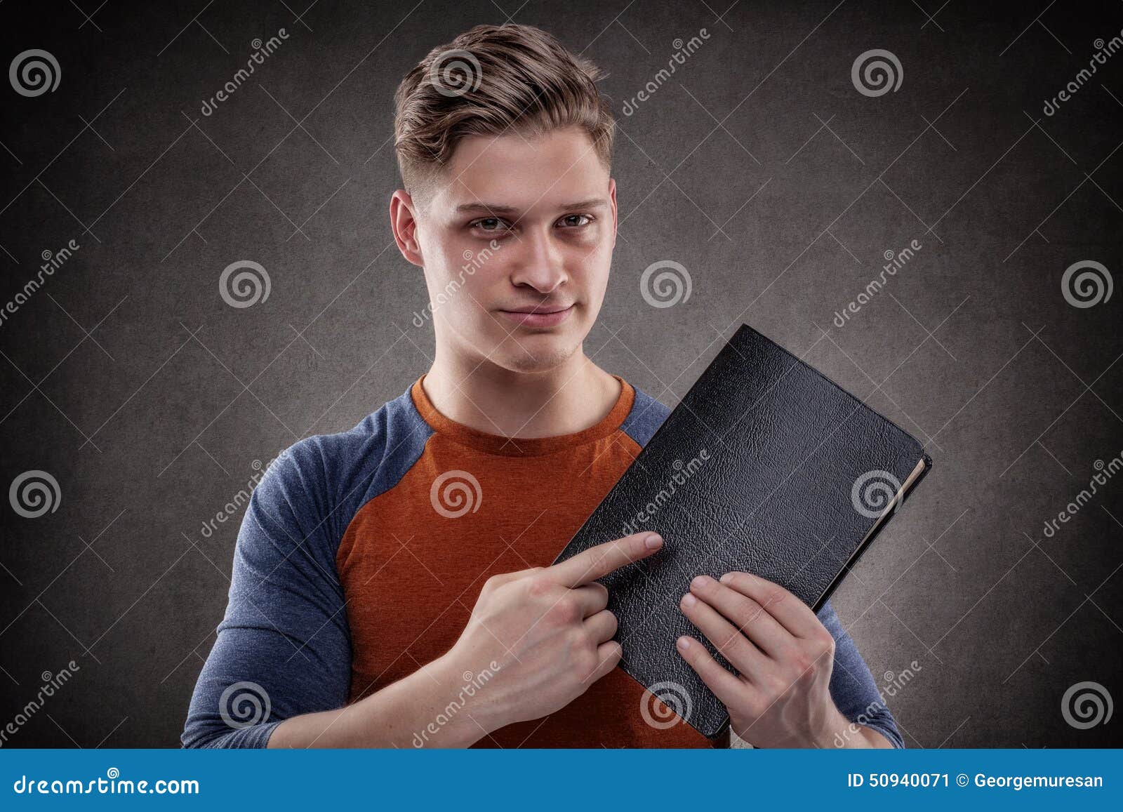 Pointing to the book stock image. Image of male, portrait - 50940071