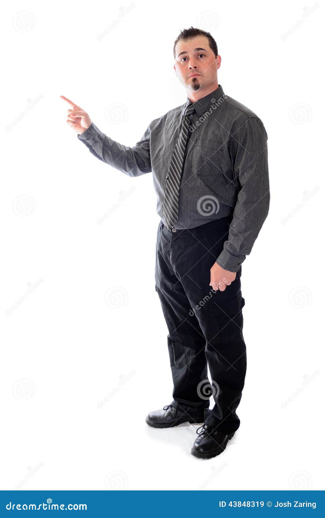 Pointing To the Left. Man in Suit Raised Eyebrows Stock Image - Image ...