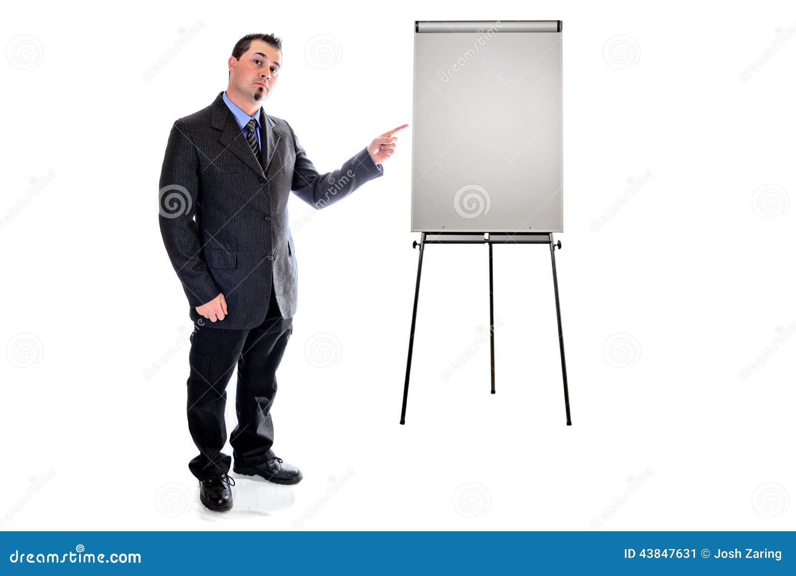 Pointing To Presentation Easel. Man in Suit Stock Image - Image of ...