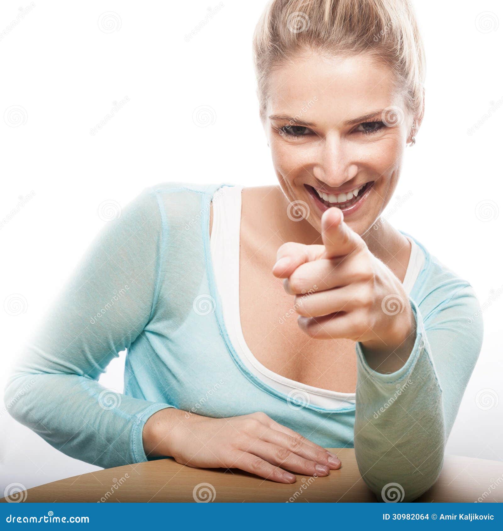 Pointing woman stock photo. Image of female, blond, tease - 30982064