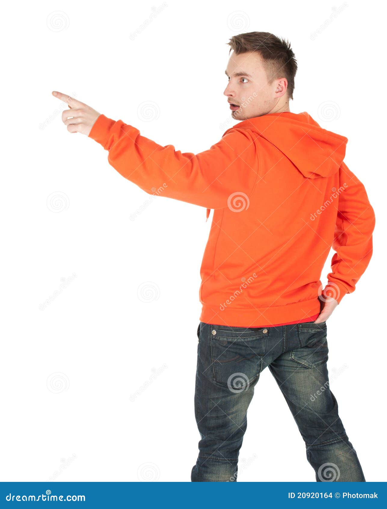 Pointing Young Man in Orange Sweatshirt Stock Photo - Image of fashion ...