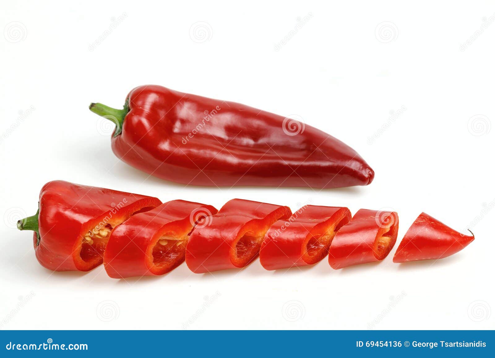 Pointy Red Pepper and One Cut into Pieces Stock Photo - Image of ...