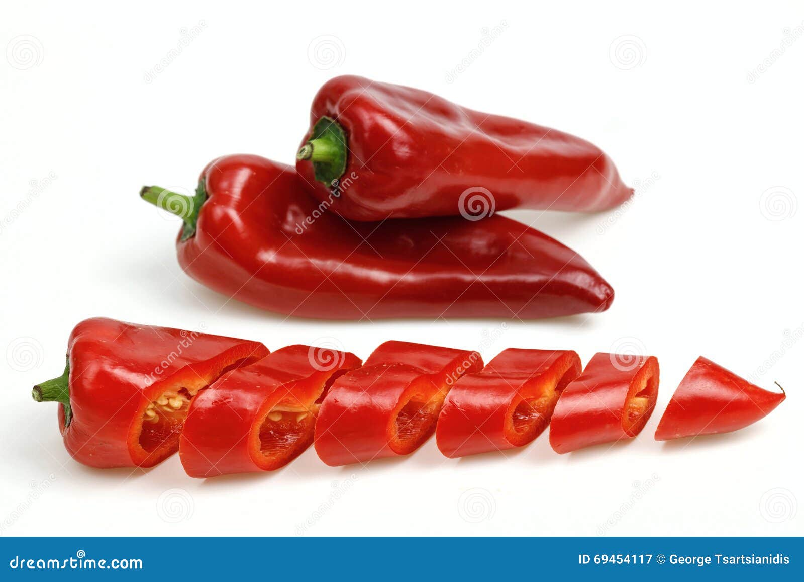 Pointy Red Peppers and One Cut into Pieces Stock Image - Image of ...