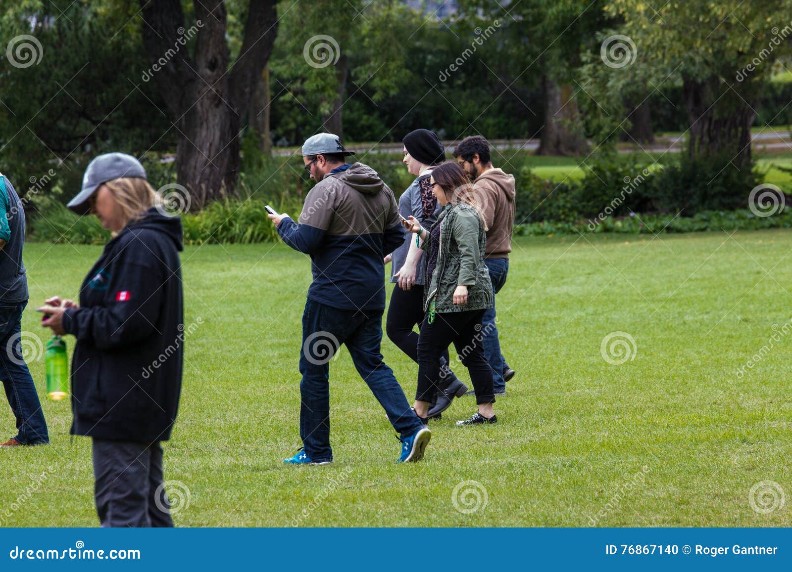 Pokemon Go Players editorial image. Image of dollars - 76867140