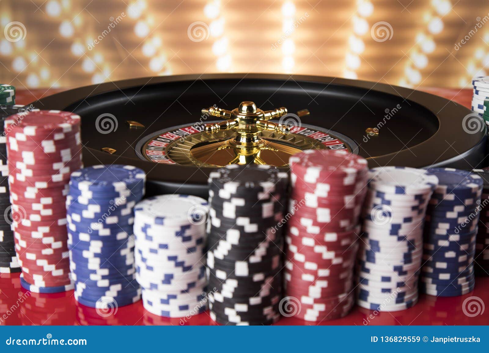 Poker Chips, Roulette Wheel in Motion, Casino Background Stock Image ...