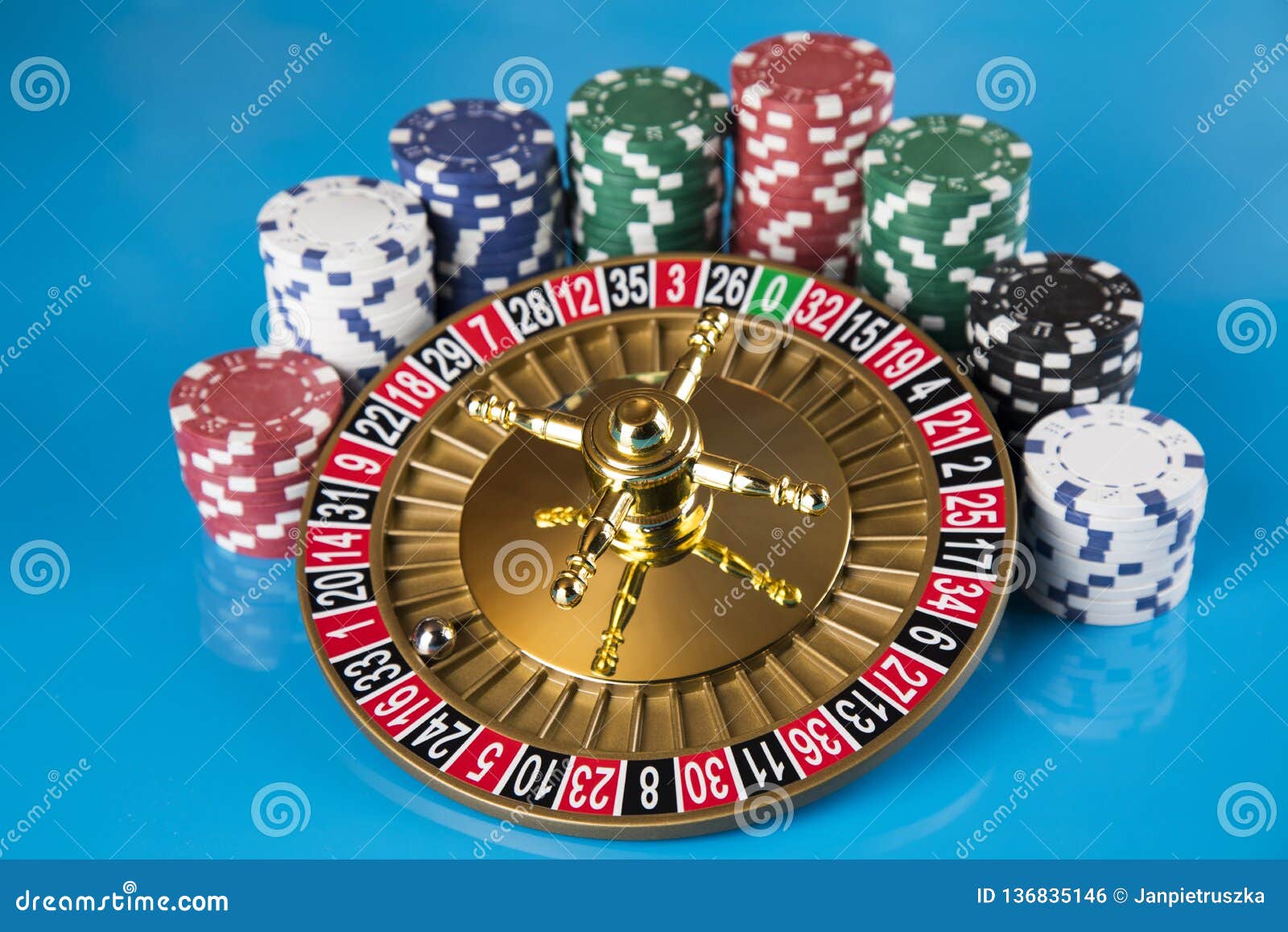 Poker Chips, Roulette Wheel in Motion, Casino Background Stock Photo ...