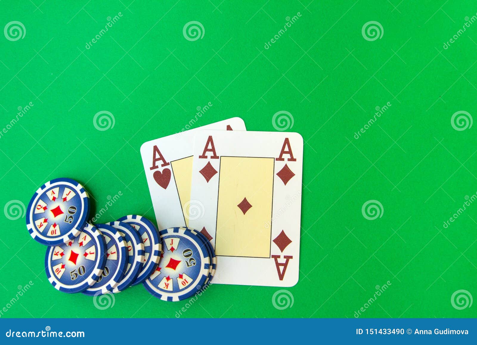 Poker Chips Stack and Playing Cards on Green Table. Stock Photo - Image ...