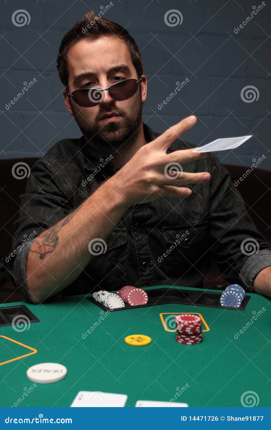 Male Poker Player Lifting The Corners Of Two Cards Aces Stock ...
