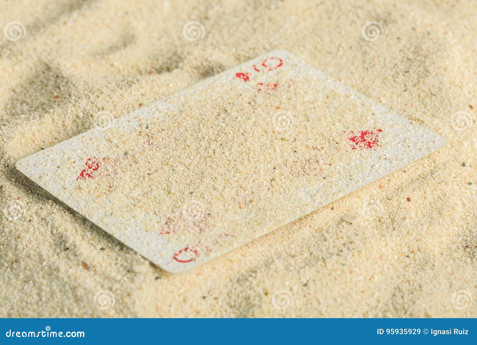 Poker Playing Cards Buried in a Sand Dune Stock Image - Image of coins ...