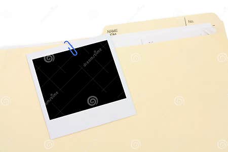 A Polaroid Photo and File Folder Stock Photo - Image of document, clip ...