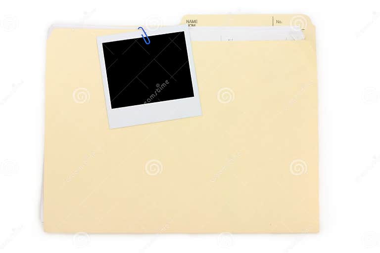 A Polaroid Photo and File Folder Stock Image - Image of office ...