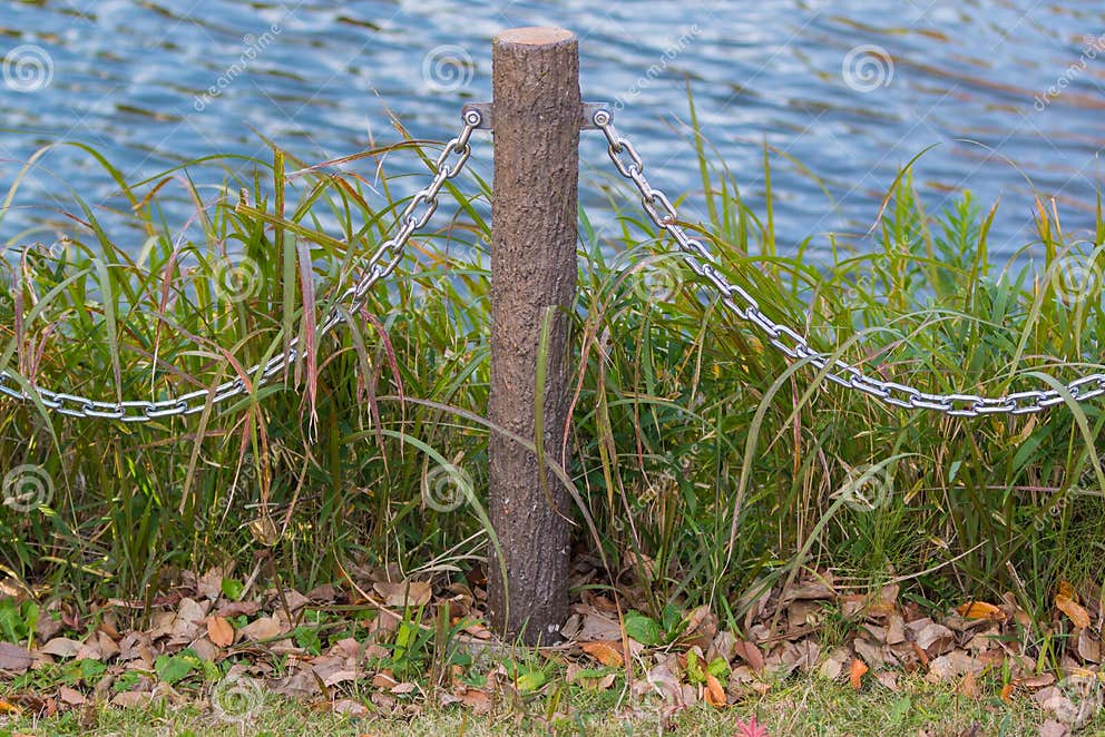 Pole and chain fence. stock image. Image of column, closeup - 66068869