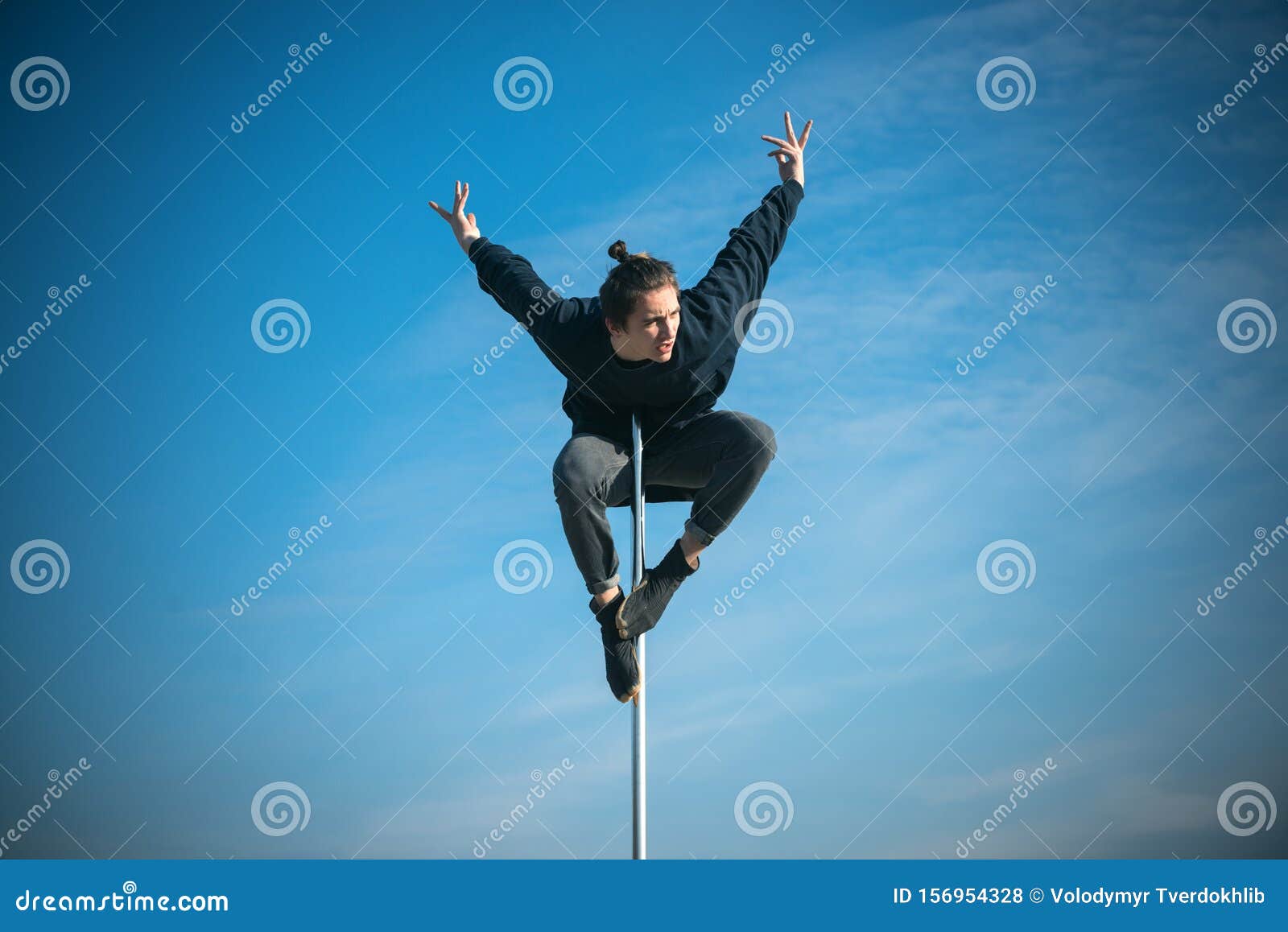 Pole Dance Fit Man Exercising with Pylon Outdoors. Stock Photo - Image ...