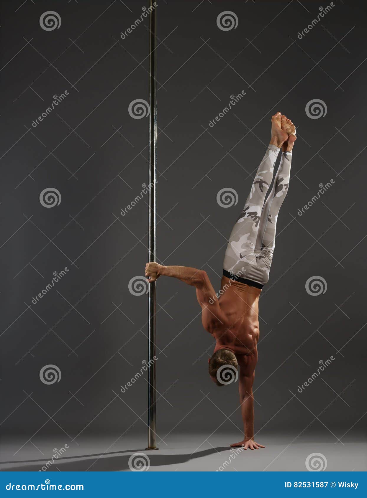 Pole Dancer Making Exercises on Pylon Studio Shot Stock Image - Image ...
