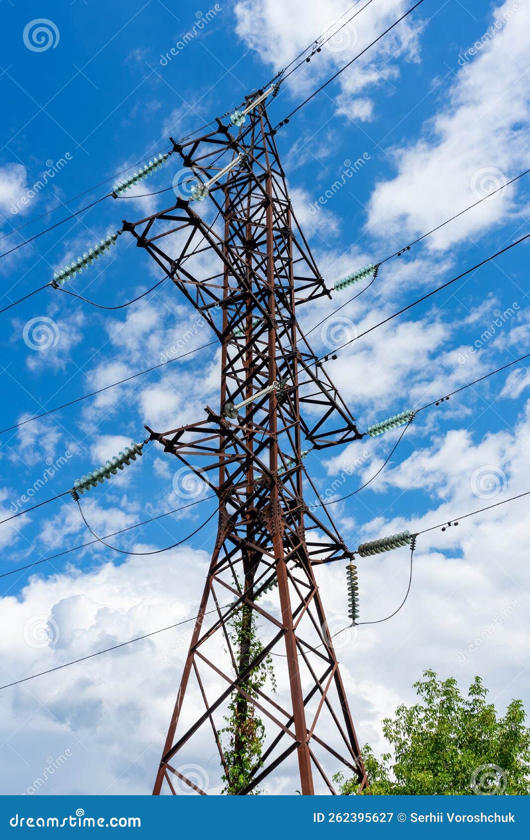 A Pole of a High-voltage Electric Line on the Background of a Blue Sky ...