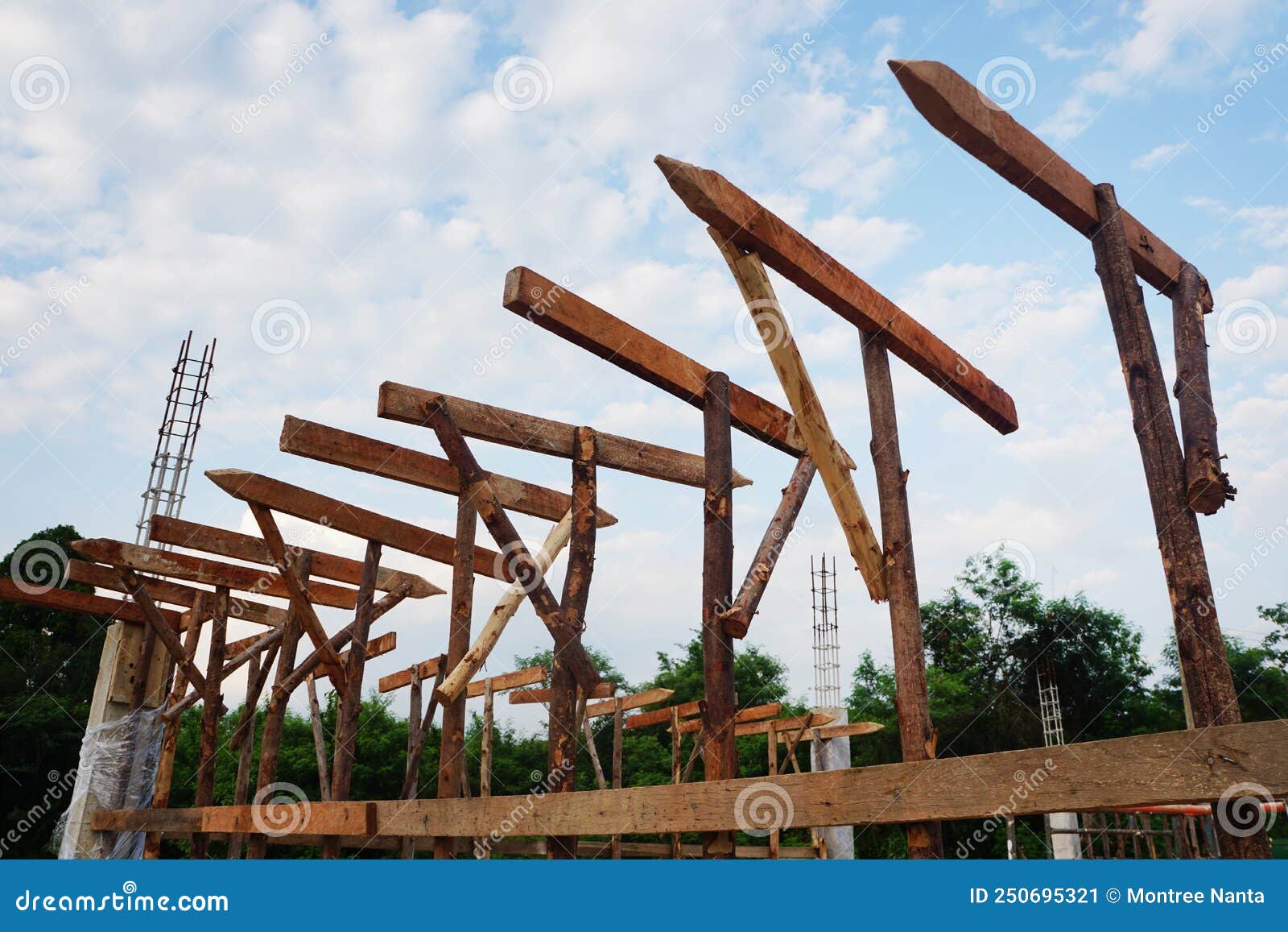 Temporary Poles and Wooden Scaffolding Support Concrete Beams at the ...