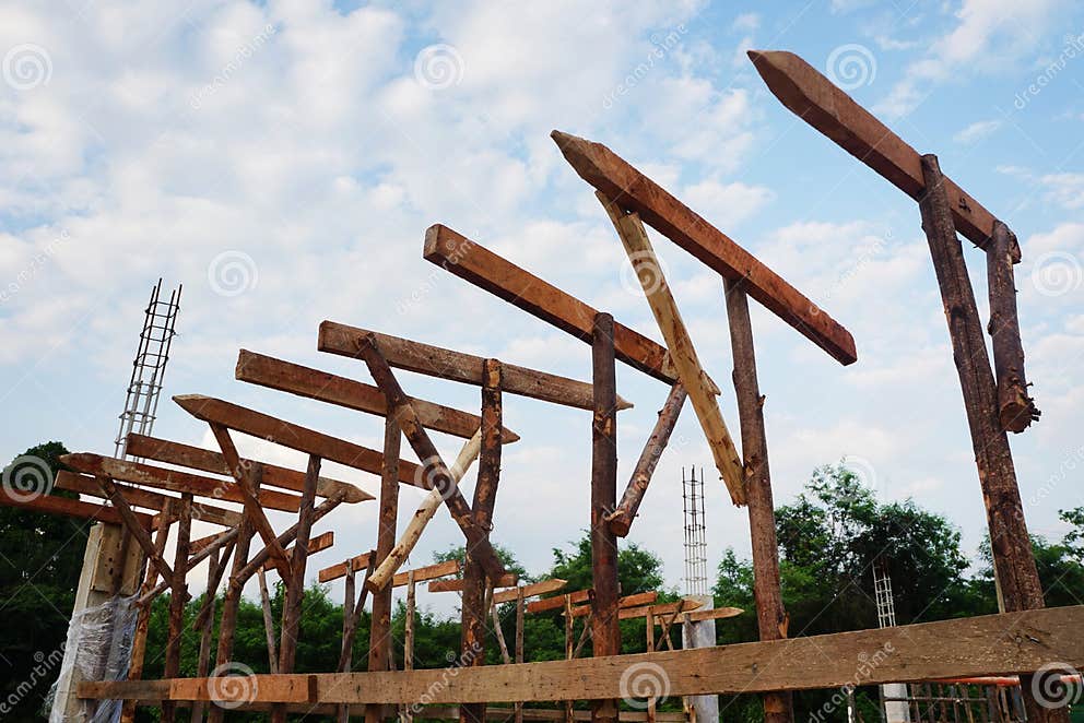 Temporary Poles and Wooden Scaffolding Support Concrete Beams at the ...