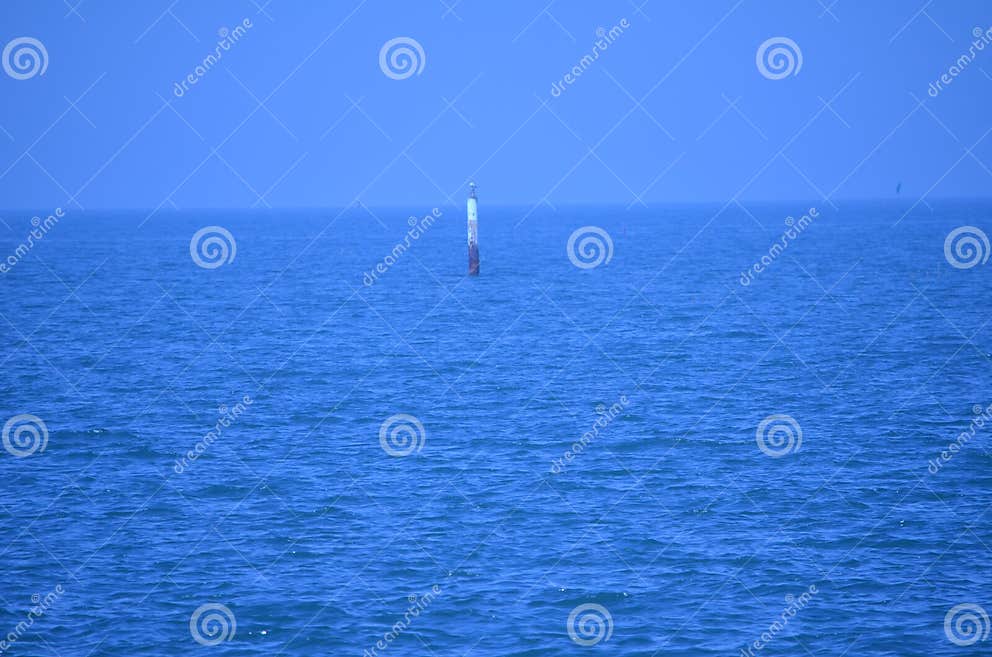 Pole in the sea. stock image. Image of pillar, blue - 106234939