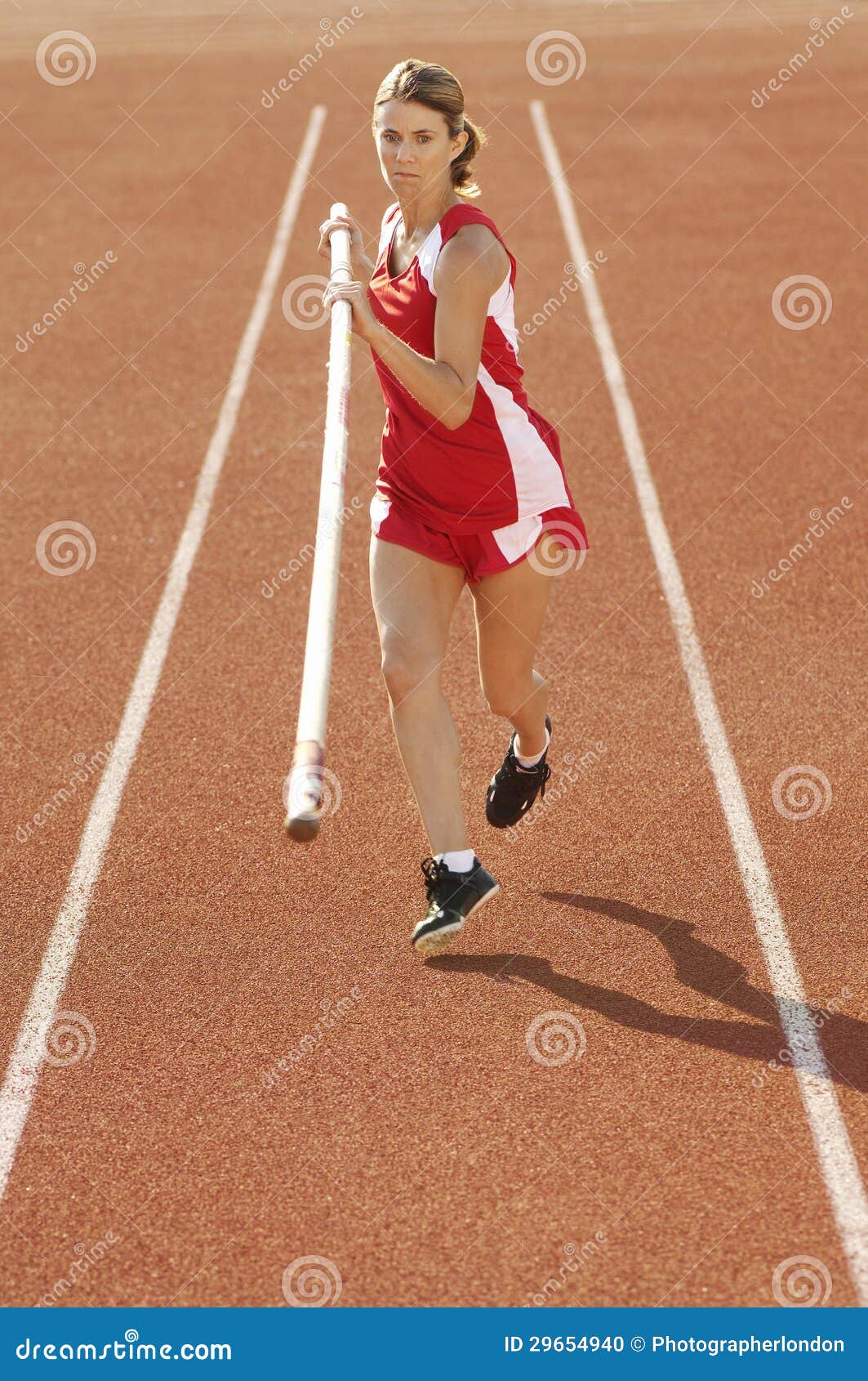 Pole Vaulter Running with Pole Stock Photo - Image of adult, athlete ...